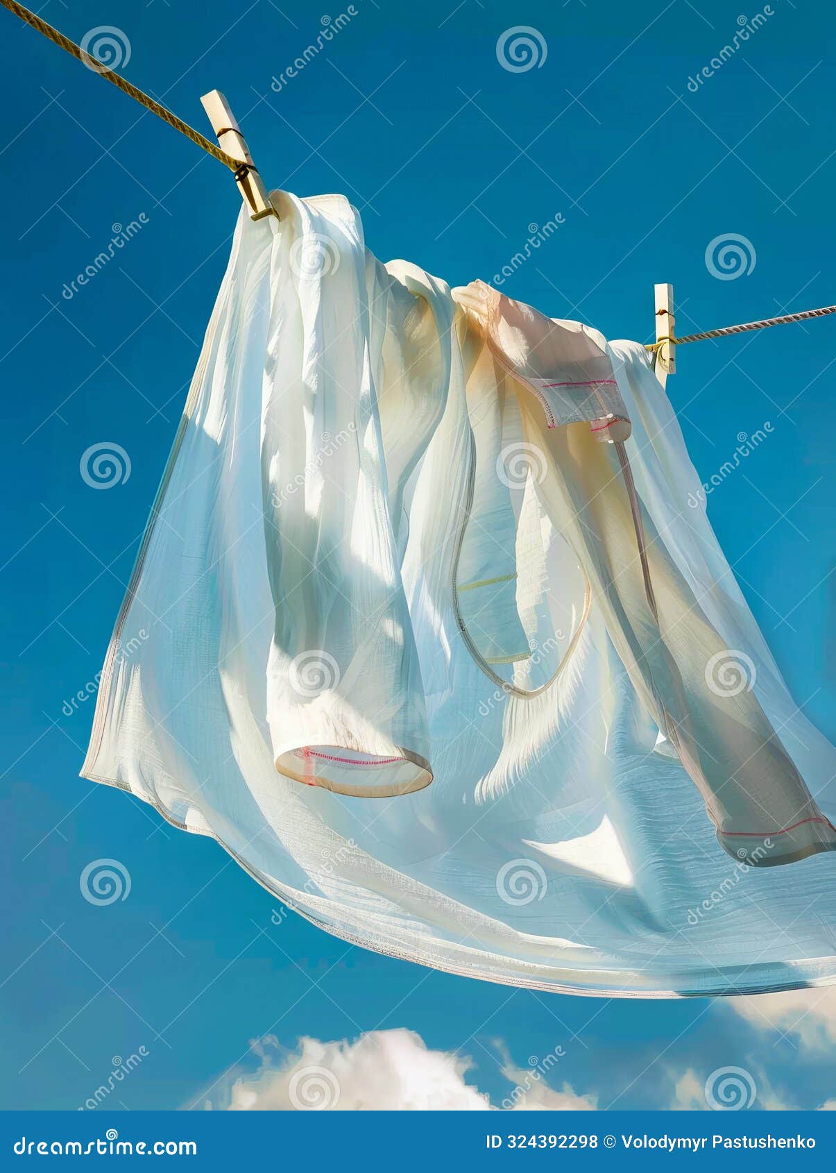 A White Cloth Hanging on a Clothes Line Stock Photo - Image of rope ...