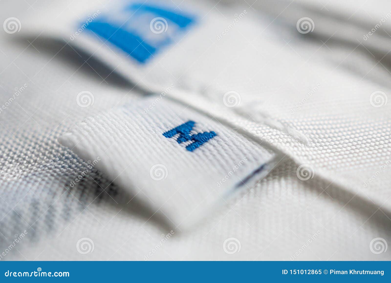 White Clothes Label Closeup on New Shirt Stock Image - Image of cotton ...
