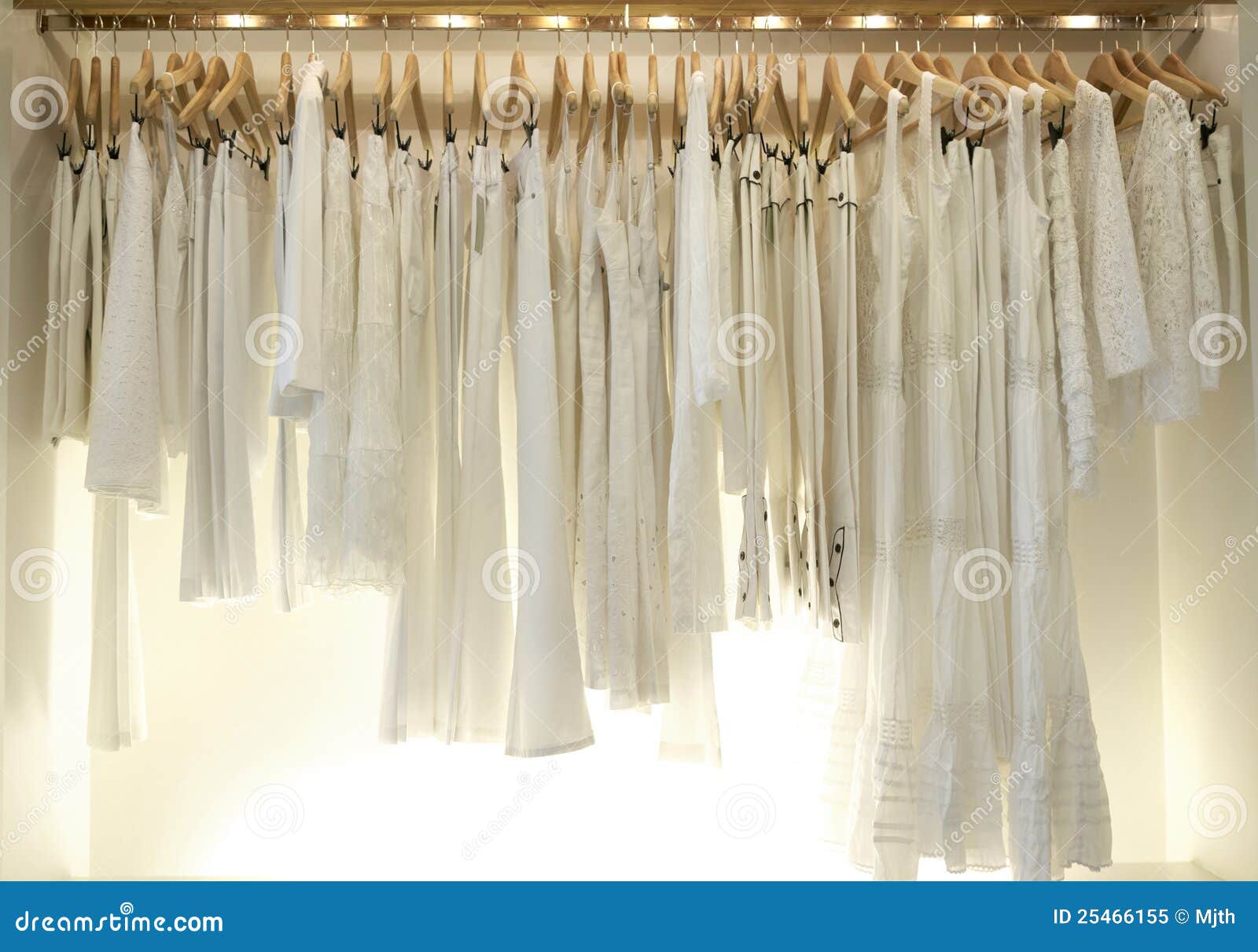 White clothes in Shop stock image. Image of pieces, fabrics - 25466155