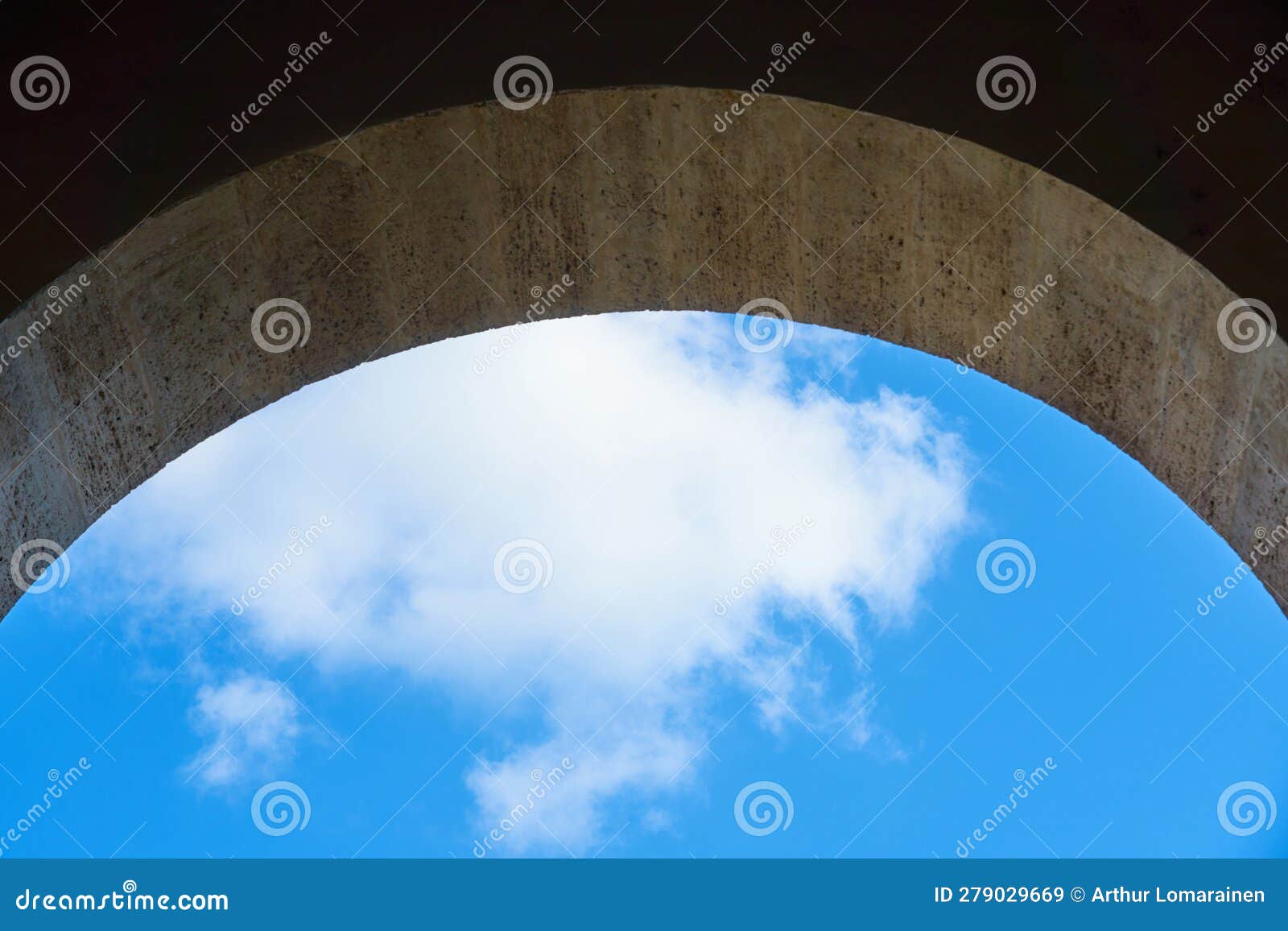 A White Cloud in the Blue Sky Behind the Arch. Stock Image - Image of ...