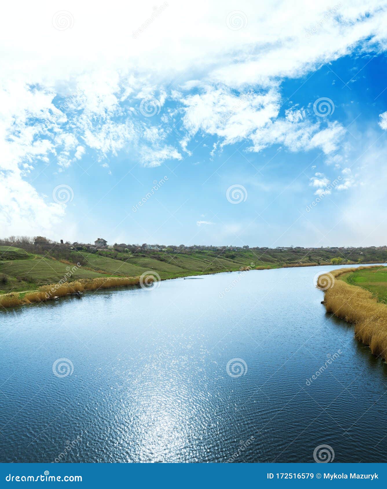 Clouds in Blue Sky and River with Sun Reflections Stock Image - Image ...