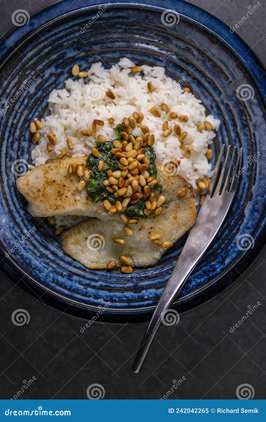 White Cod with Homemade Basil Pesto and Roasted Pine Kernels Stock ...