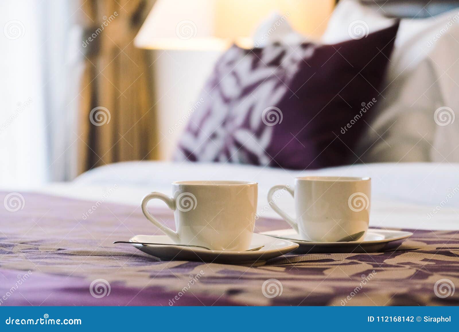 White coffee cup on bed stock photo. Image of cups, drink - 112168142