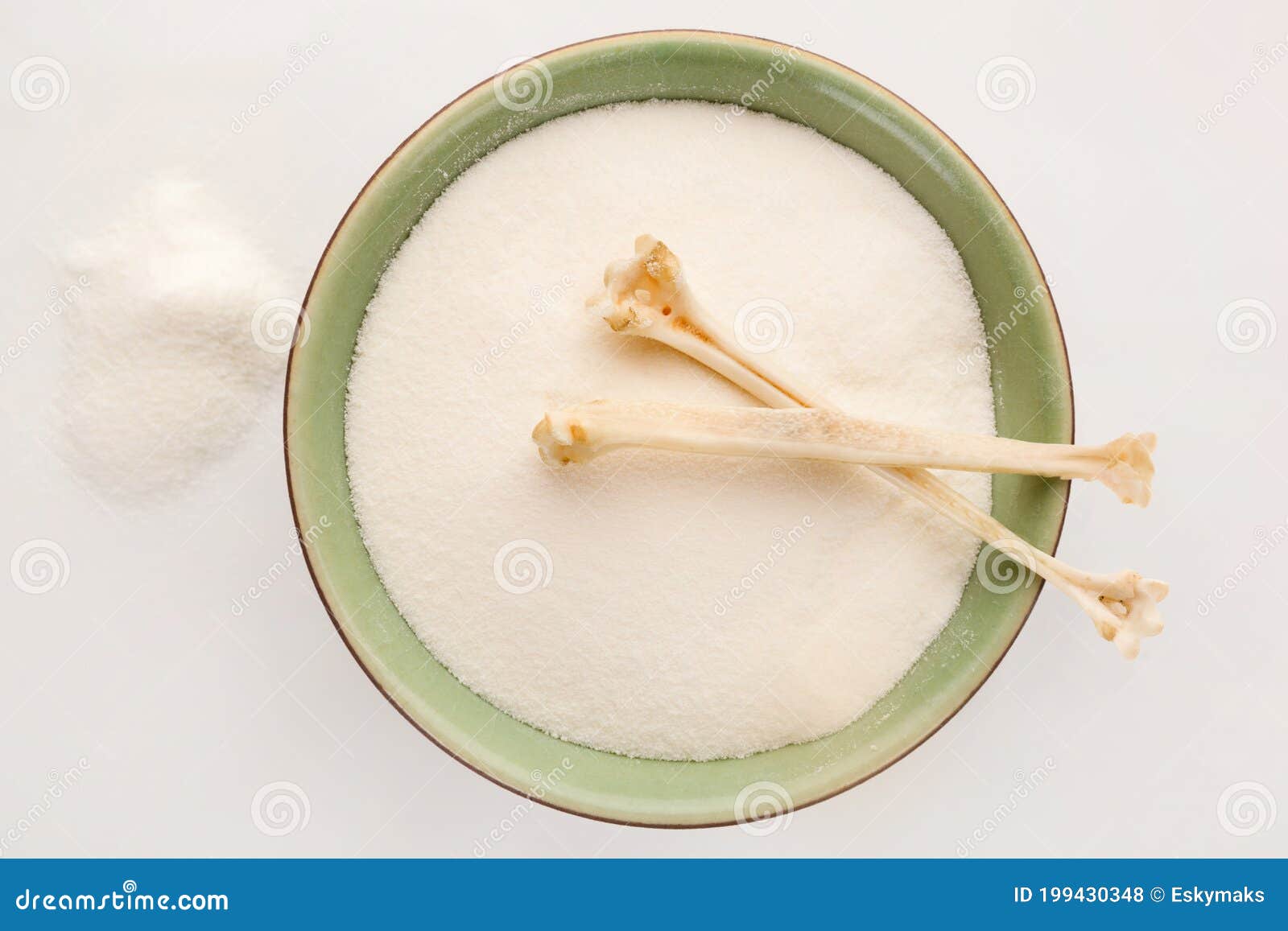 White Collagen Powder and Bones with Copy Space from Above Stock Photo ...