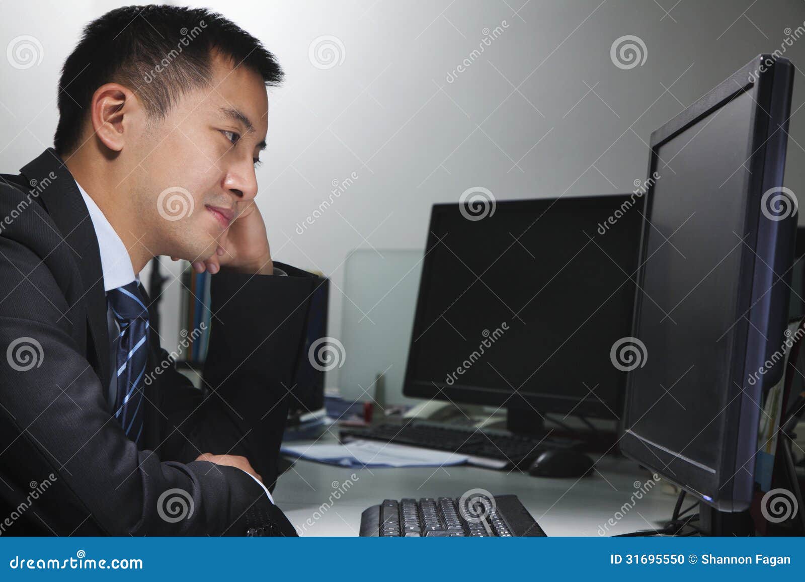 White-collar Worker Sitting in Front of Computer in Office Stock Photo ...