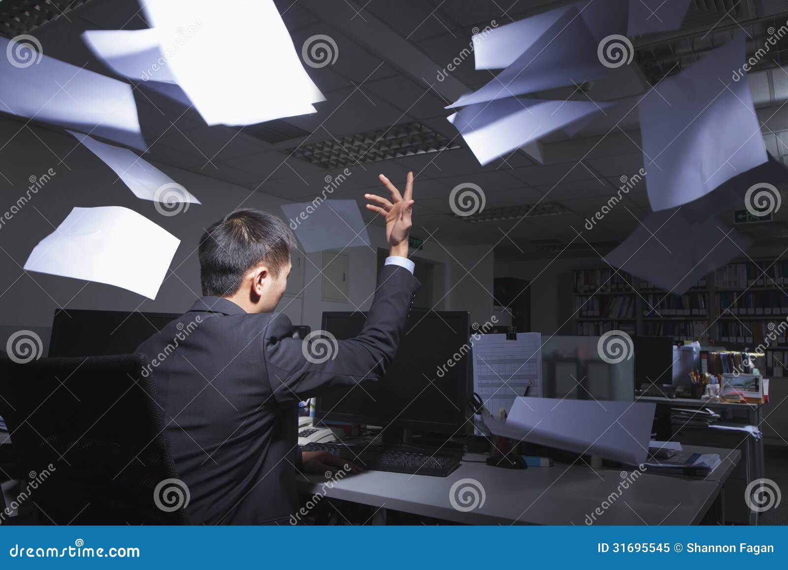 White-collar Worker Throwing White Sheets in Air in Office Stock Image ...