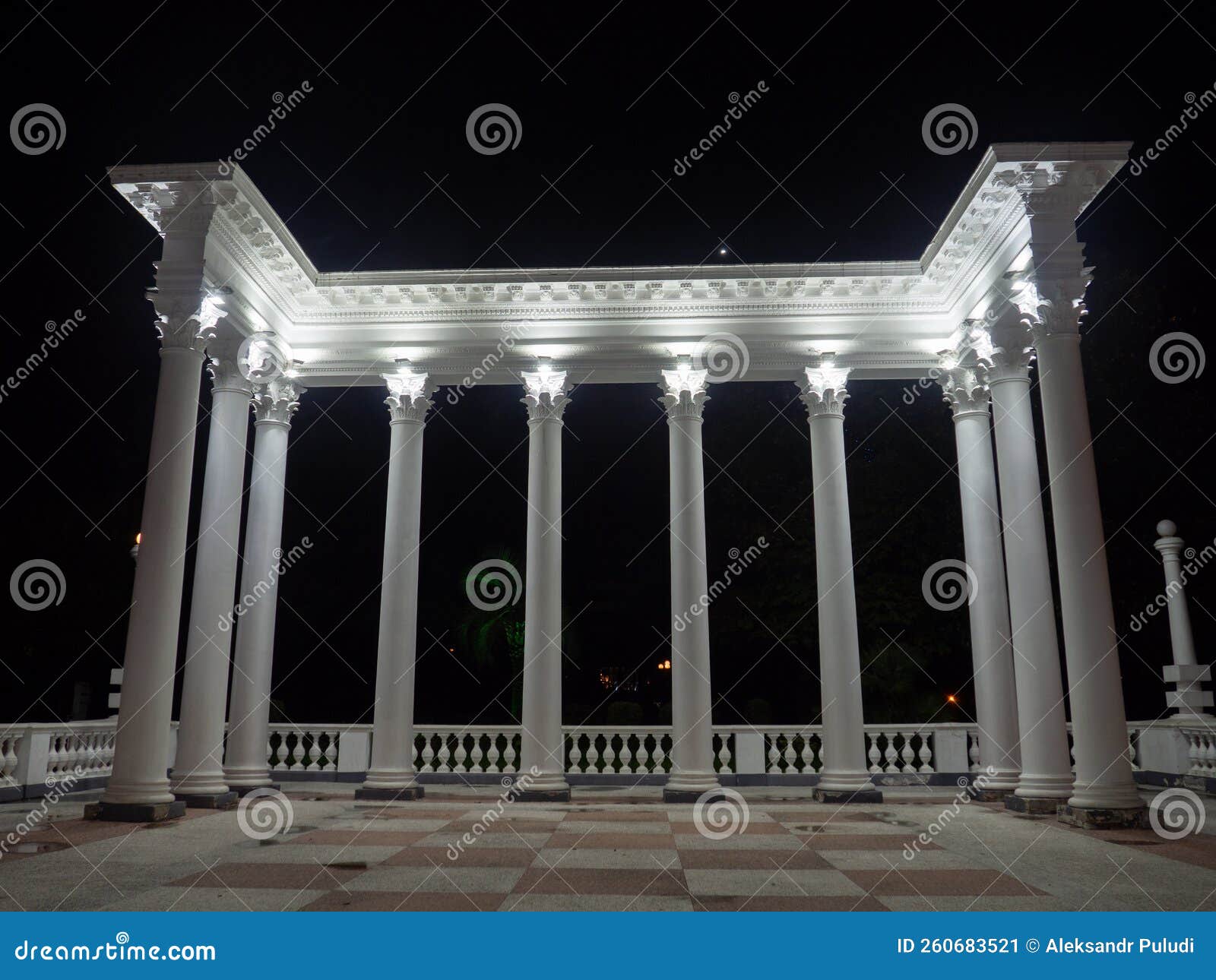 White Colonnade in the Dark. White Columns in the Light of Spotlights ...
