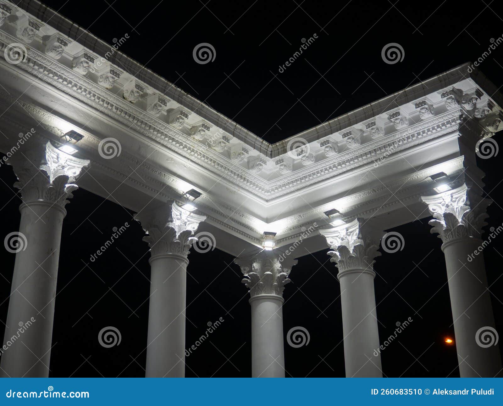 White Colonnade in the Dark. White Columns in the Light of Spotlights ...