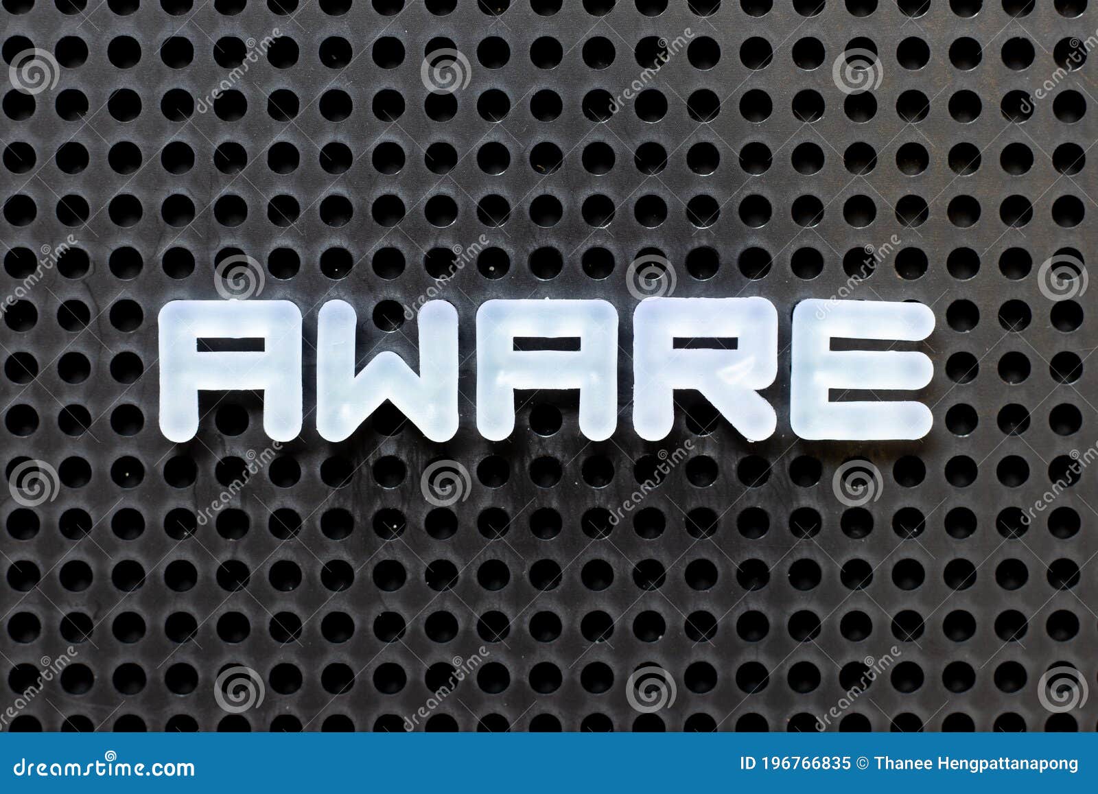 White Alphabet With Word Aware On Black Pegboard Background Royalty ...
