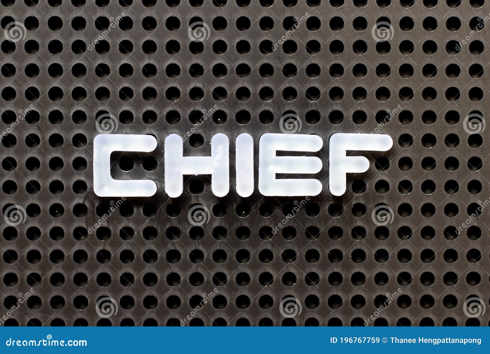 White Alphabet With Word Chief On Black Pegboard Background Royalty ...