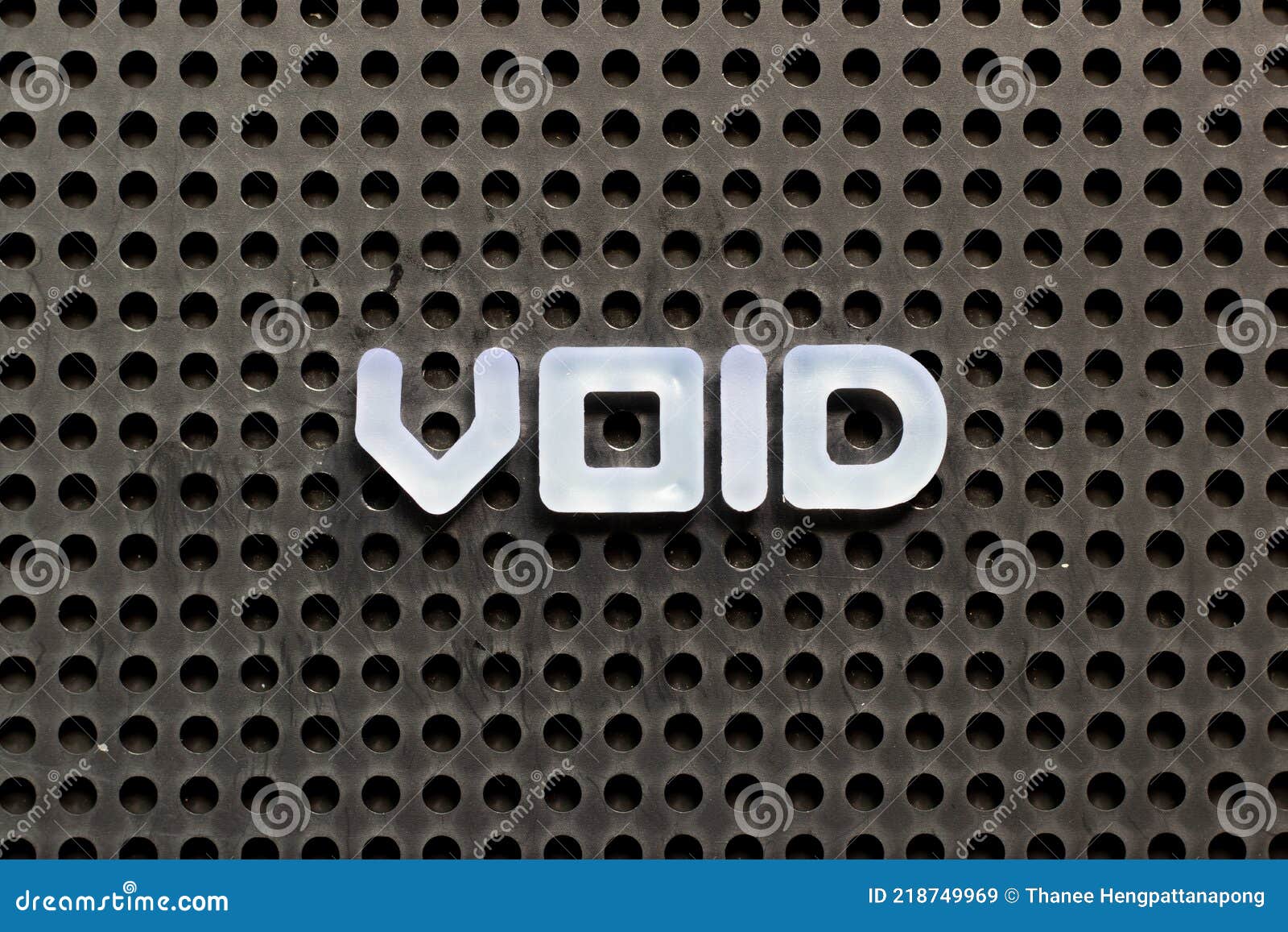 White Letter In Word Void On Black Pegboard Background Stock Image ...