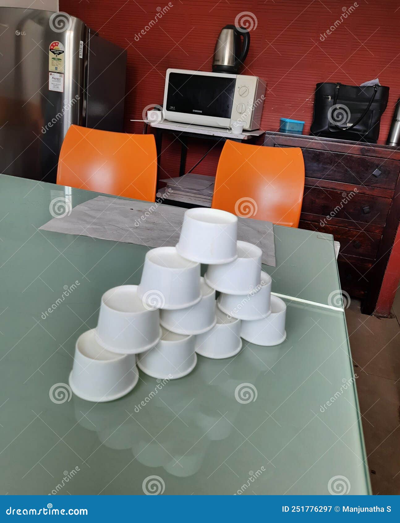 White Color Paper Coffee Cup Tower or Pyramid in the Table Stock Image ...