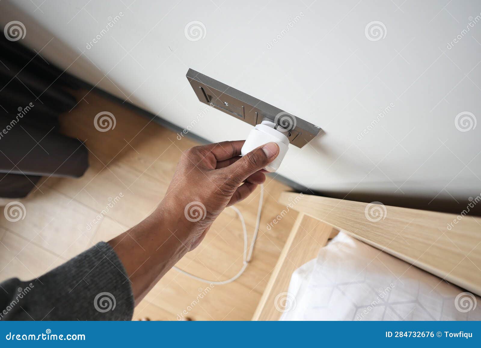 White Color Power Cord Cable Plugged into Wall Stock Photo - Image of ...