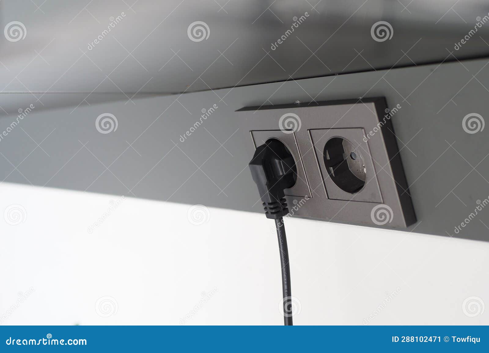 White Color Power Cord Cable Plugged into Wall Stock Image - Image of ...