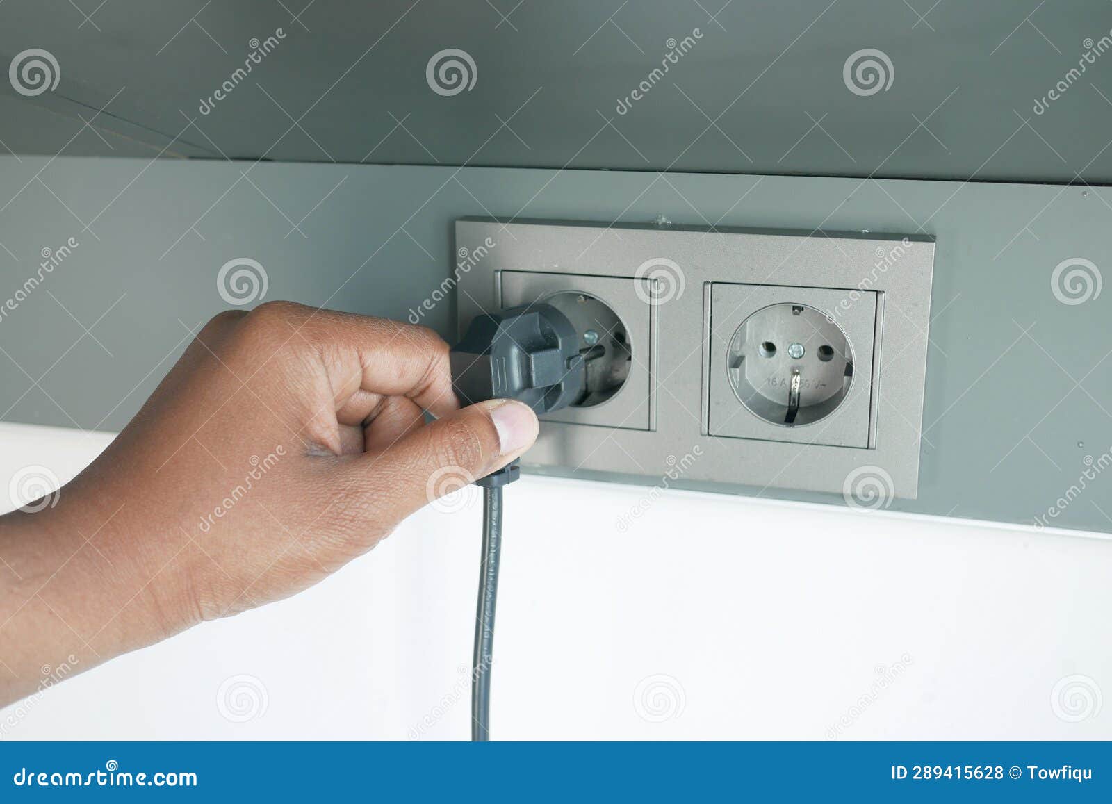 White Color Power Cord Cable Plugged into Wall Stock Photo - Image of ...