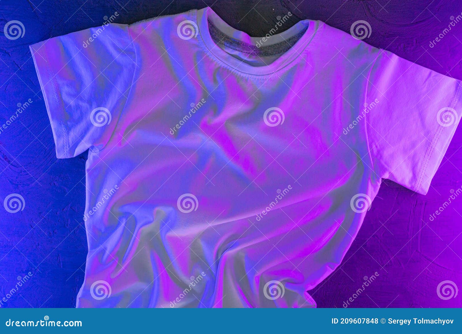 White Color Unisex T-shirt in Neon Light Stock Photo - Image of white ...