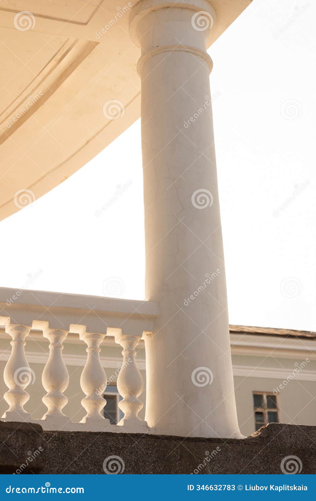 A White Column with a Balcony Railing on Either Side Stock Image ...