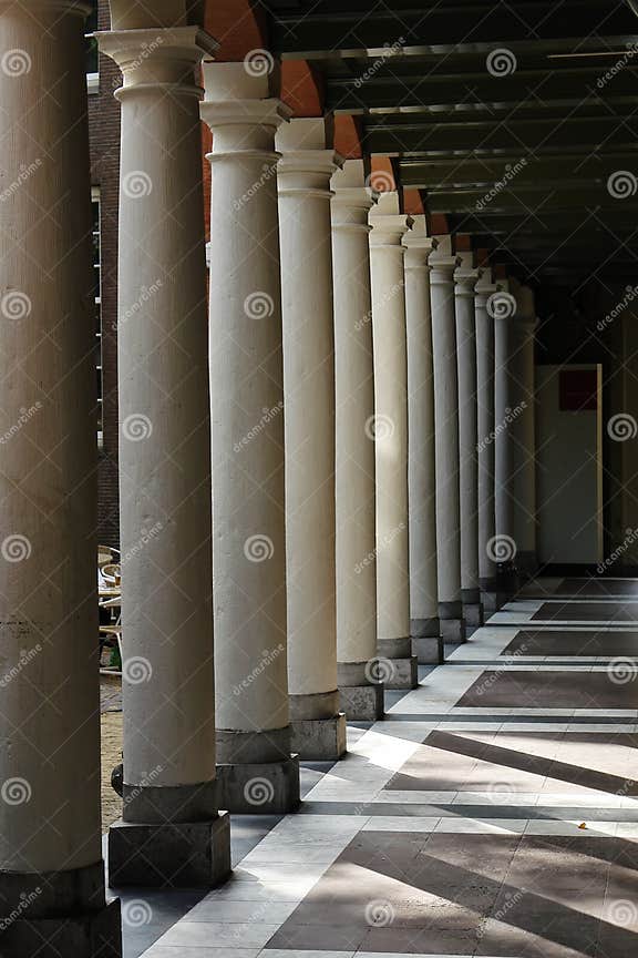White columns in a row stock image. Image of sunlight - 24400647