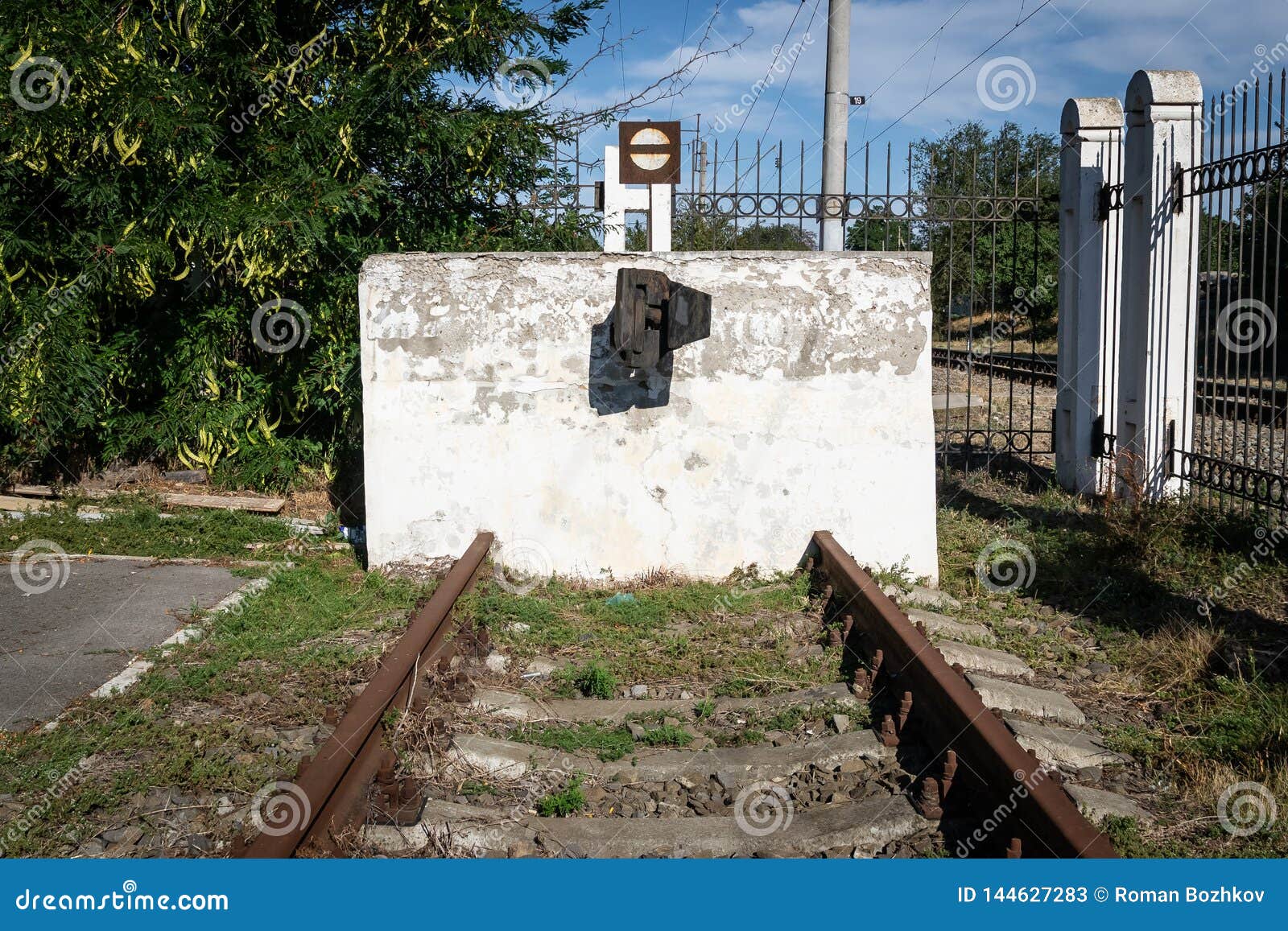 White Concrete Buffer Stop Standing at the End of the Railway Track ...