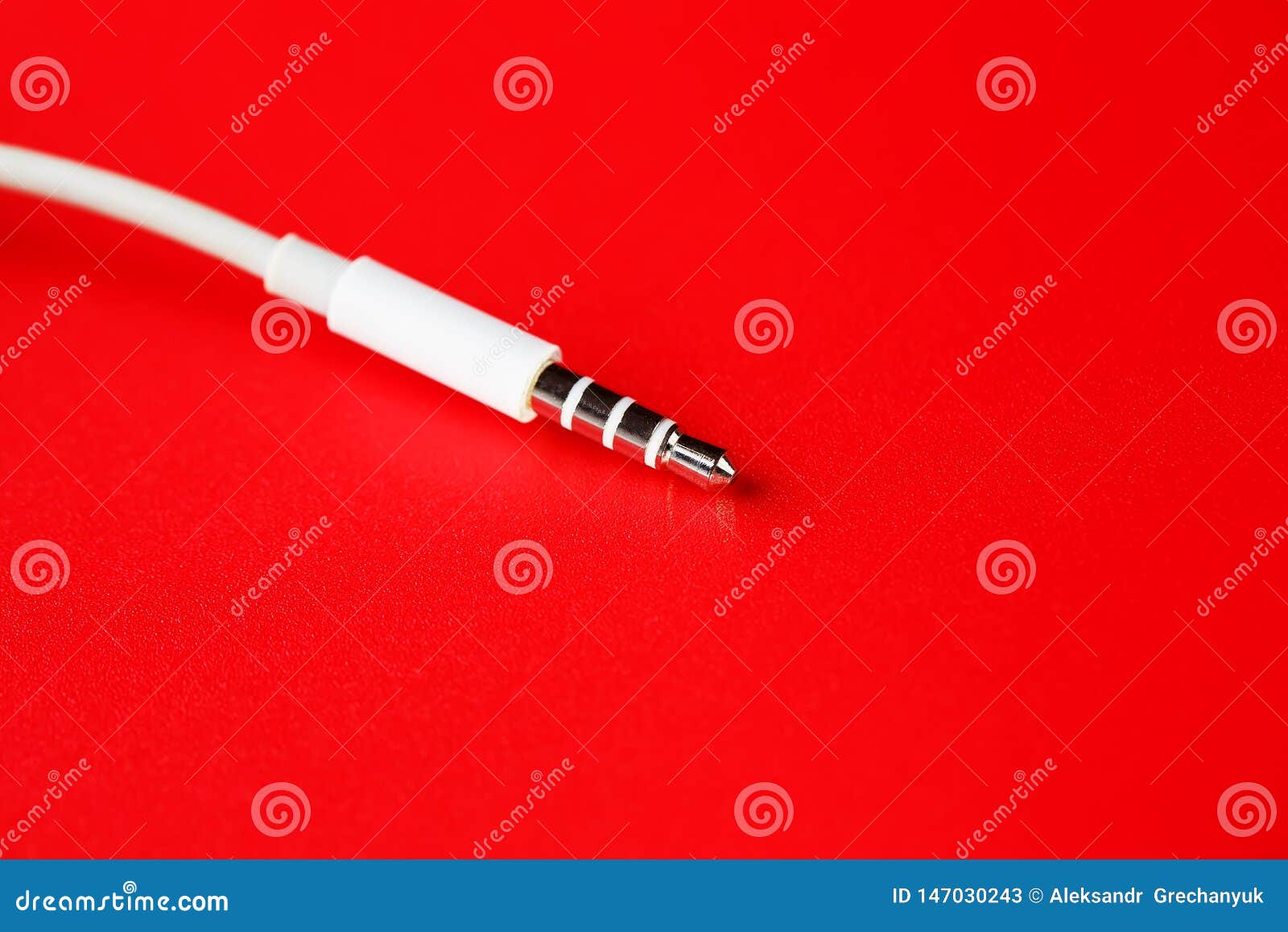 White Connector AUX White Cable on a Red Background Stock Image - Image ...