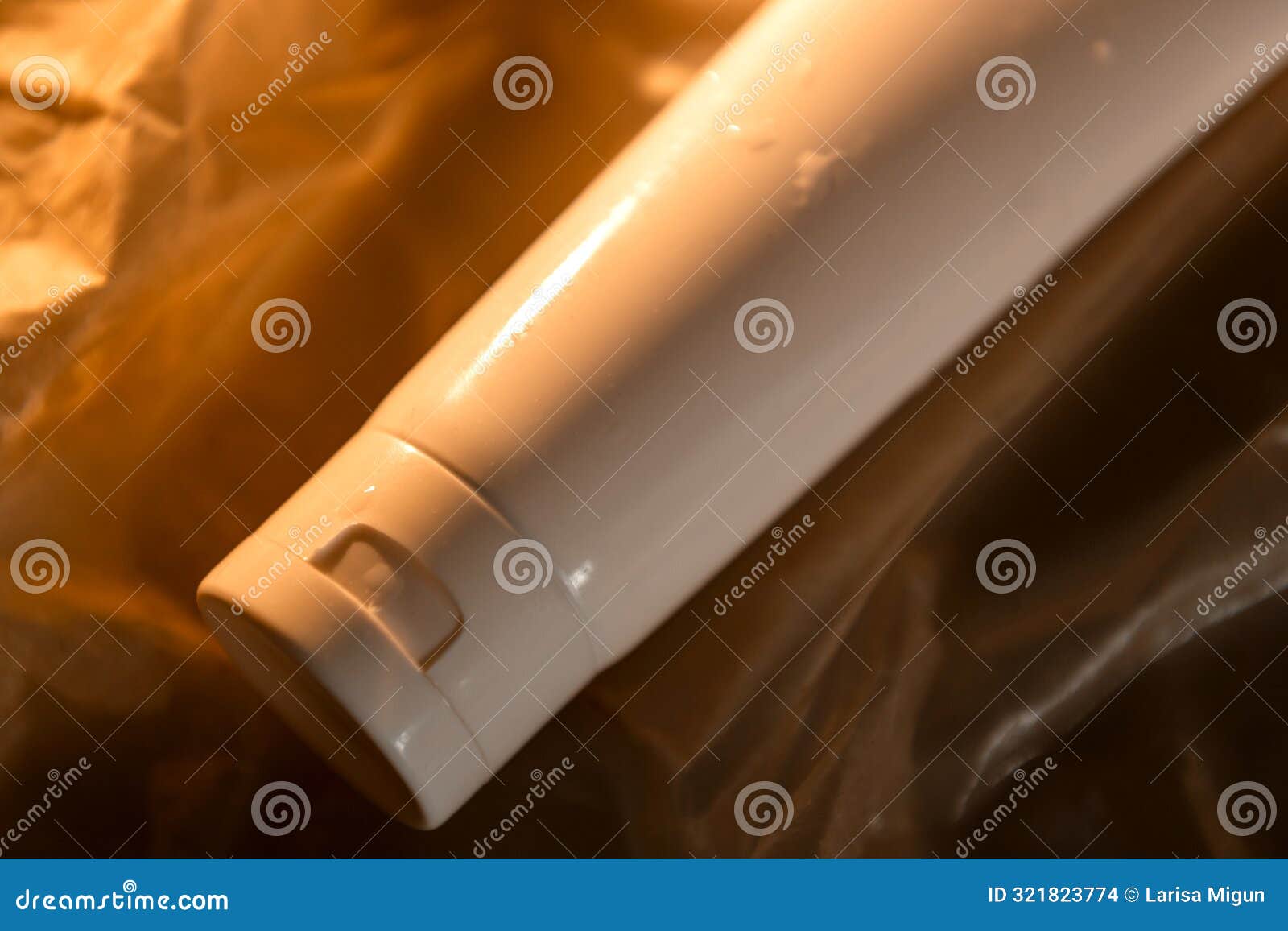 White Container in the Rays of the Setting Sun. with Splashes of Water ...