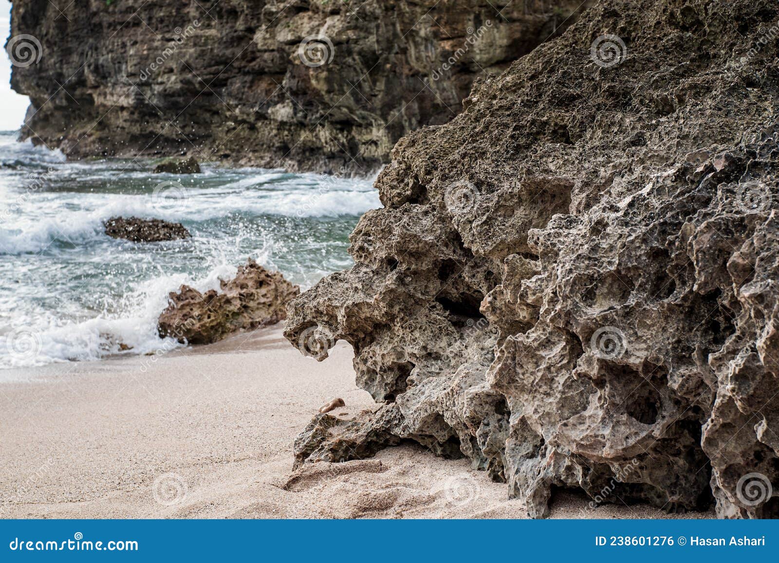 White Coral Rocks on a White Sandy Beach that is Hit by the Waves Stock ...