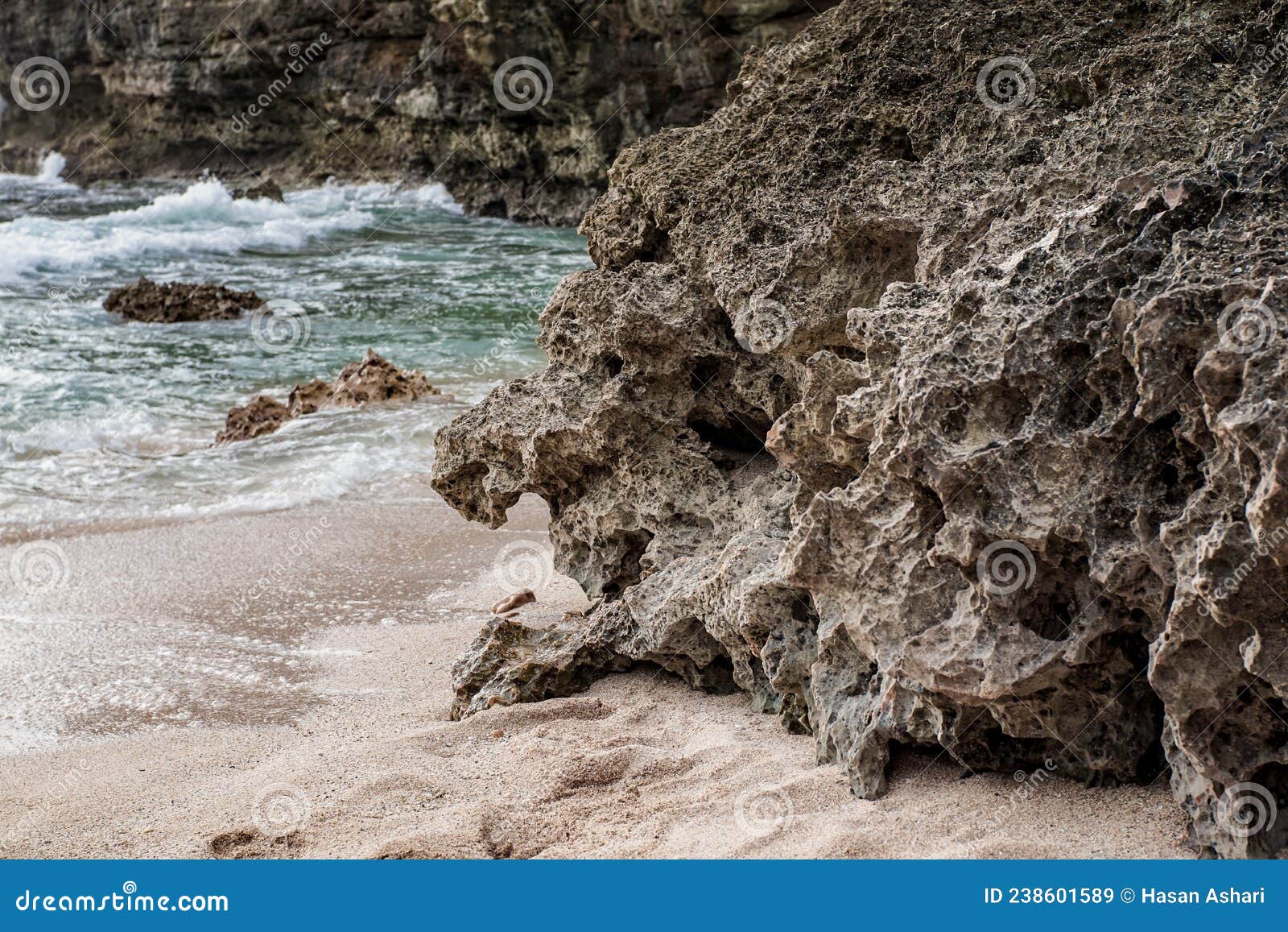 White Coral Rocks on a White Sandy Beach that is Hit by the Waves Stock ...