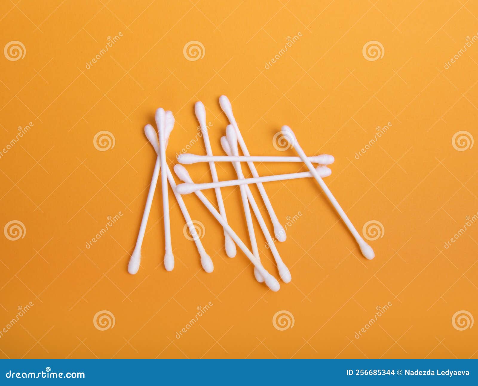 White Cotton Swabs on an Orange Background Stock Photo - Image of ...