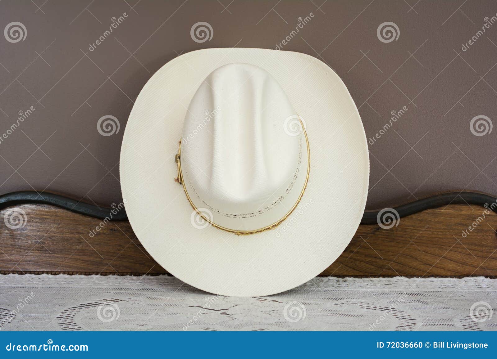 A White Cowboy Hat on an Antique Cabinet Front View Stock Photo - Image ...