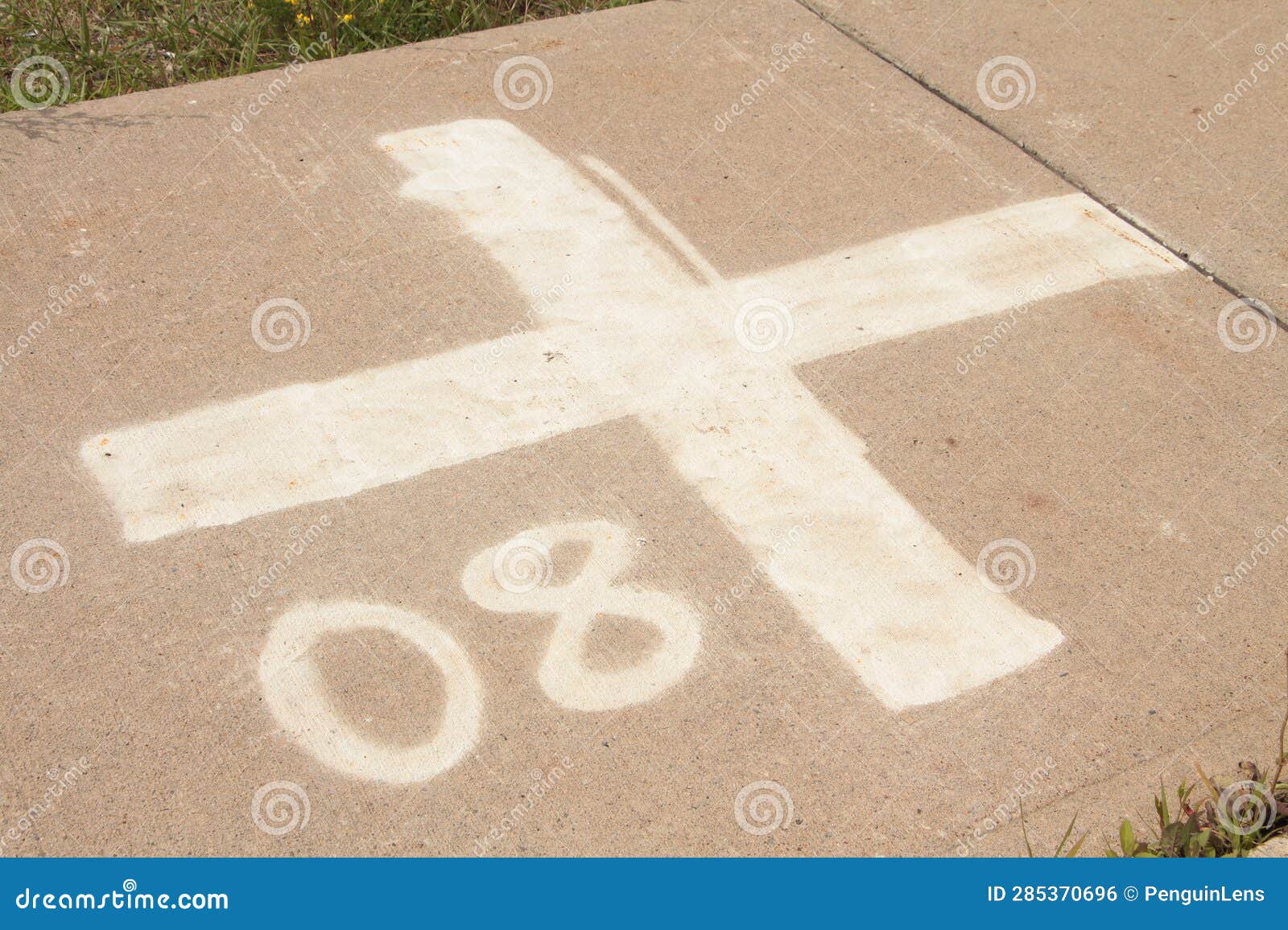 White Cross and Numbers 08 in Bottom Left of Cross Spray Painted on ...