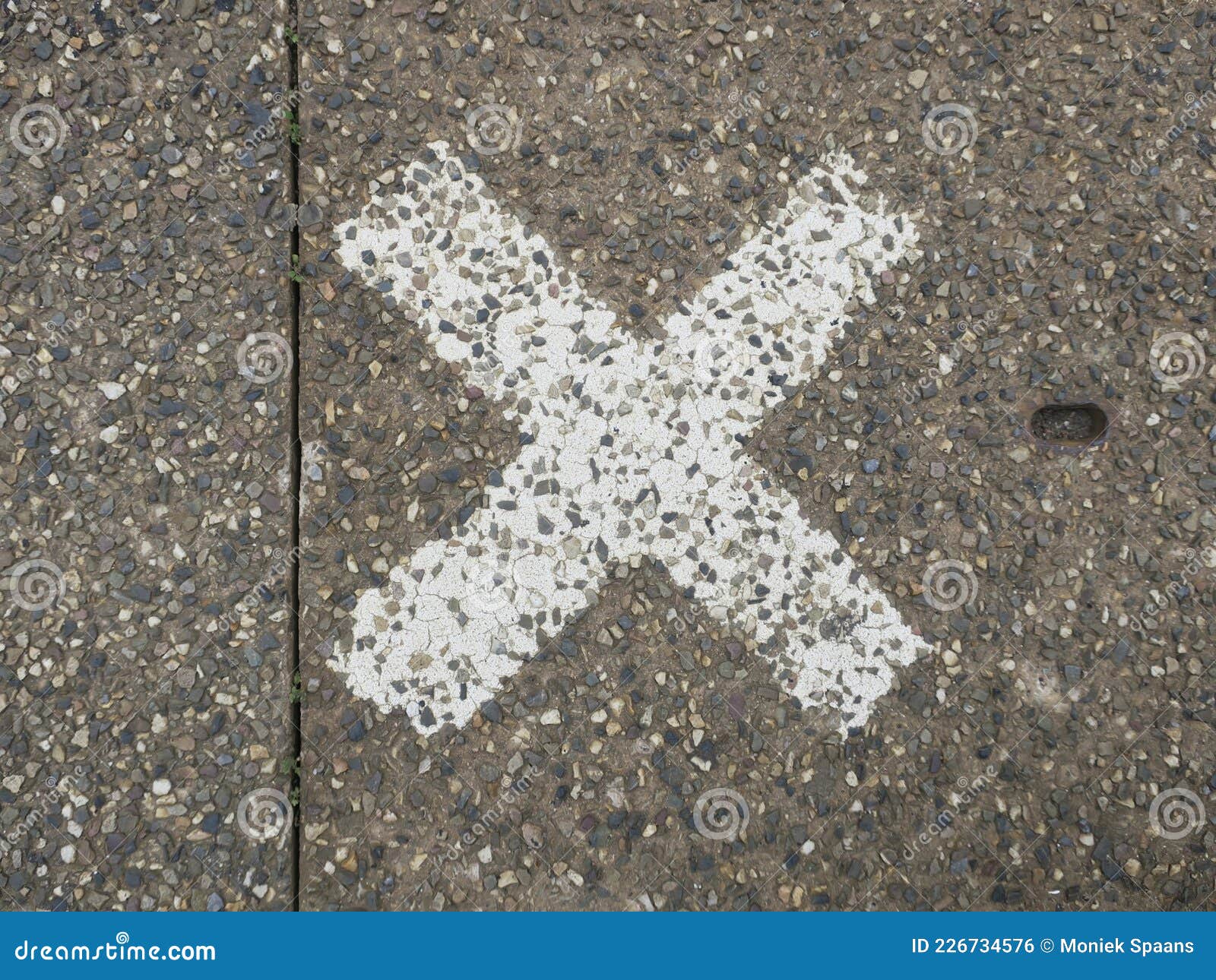 White Cross Painted on a Paving Stone of the Sidewalk Stock Photo ...