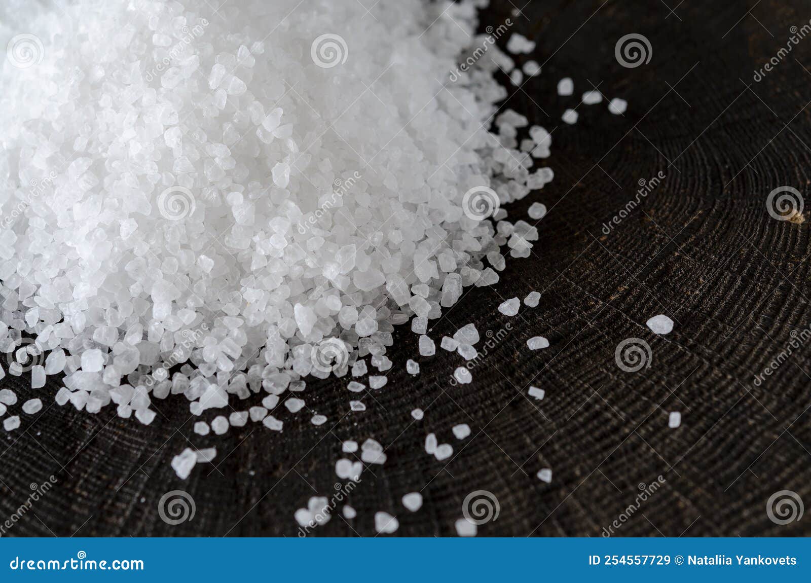 White Crystals of Salt Scattered on a Wooden Background Stock Image ...