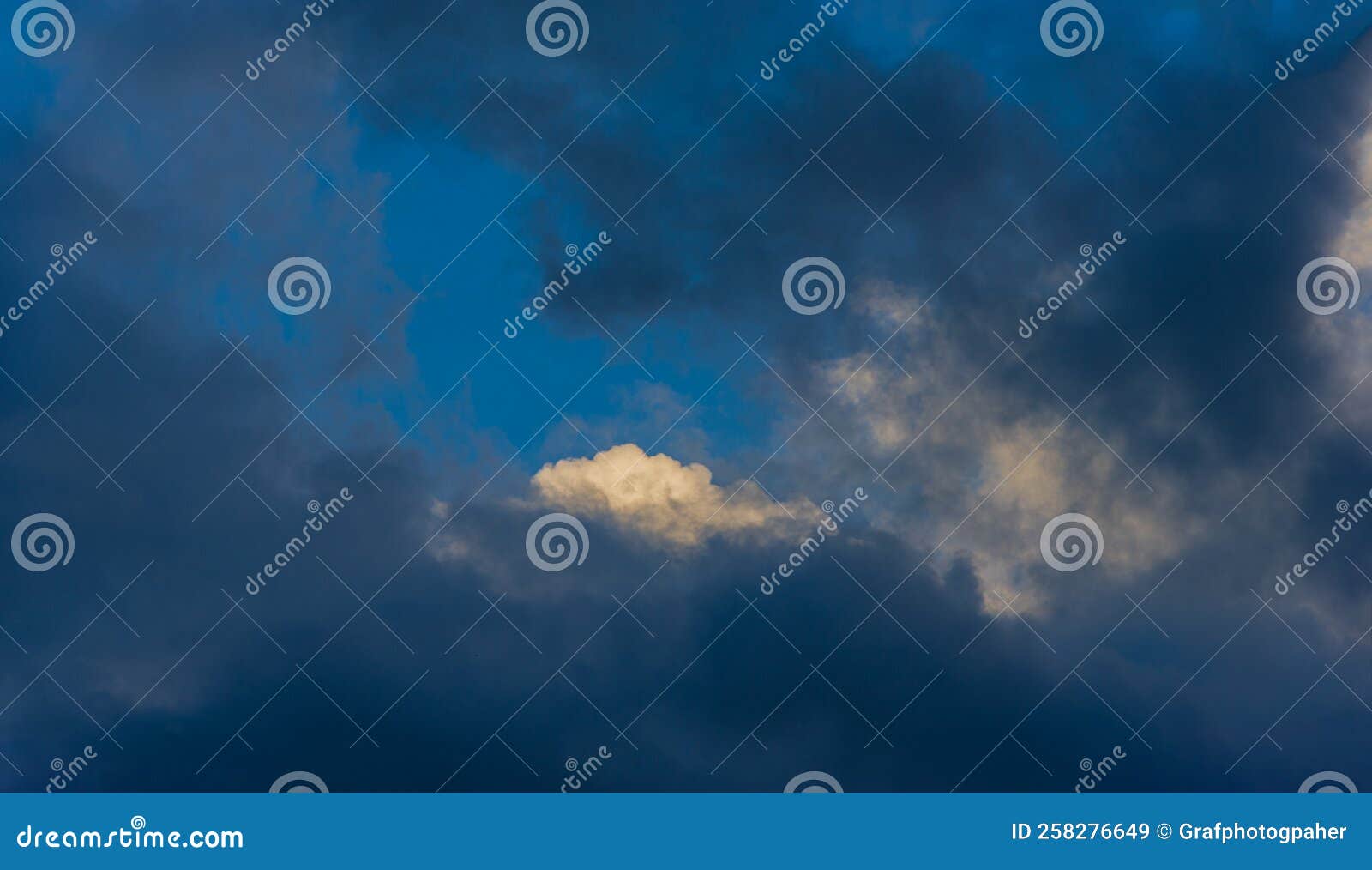 White Cumulus Cloud among Dark Rain Clouds Stock Image - Image of ...
