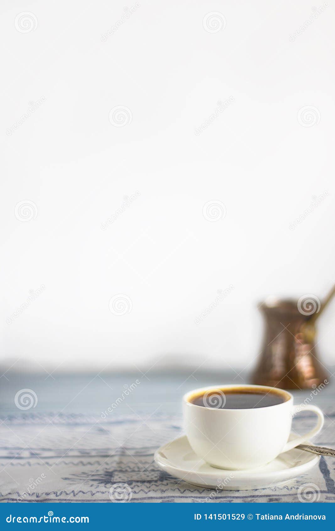White Cup of Black Coffee on Light Background with Defocused Copper ...