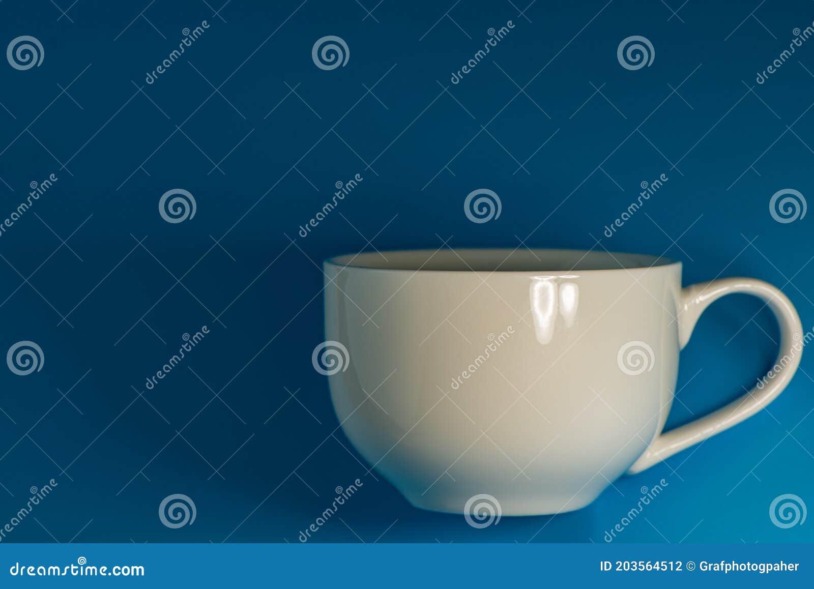 White Cup and Dark Shadow on a Blue Background. Business Concept Stock ...