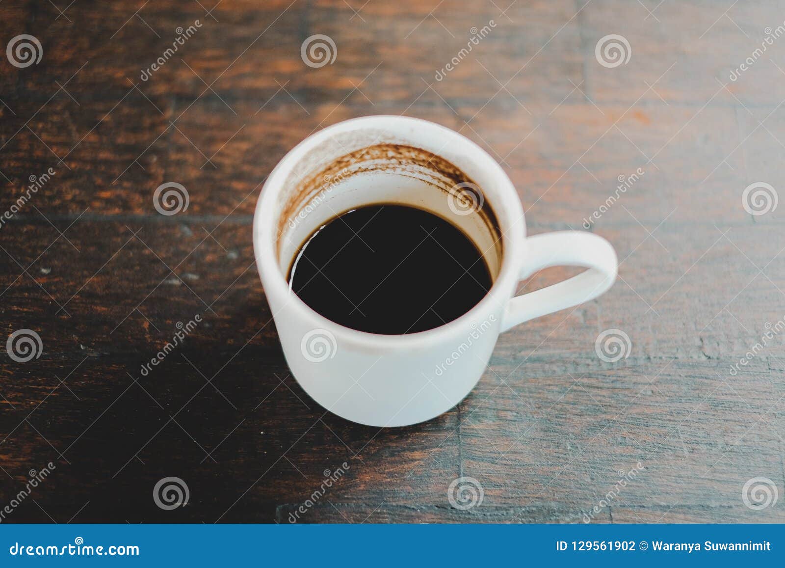 White Cup with the Remains of Coffee Stock Photo - Image of space, wood ...