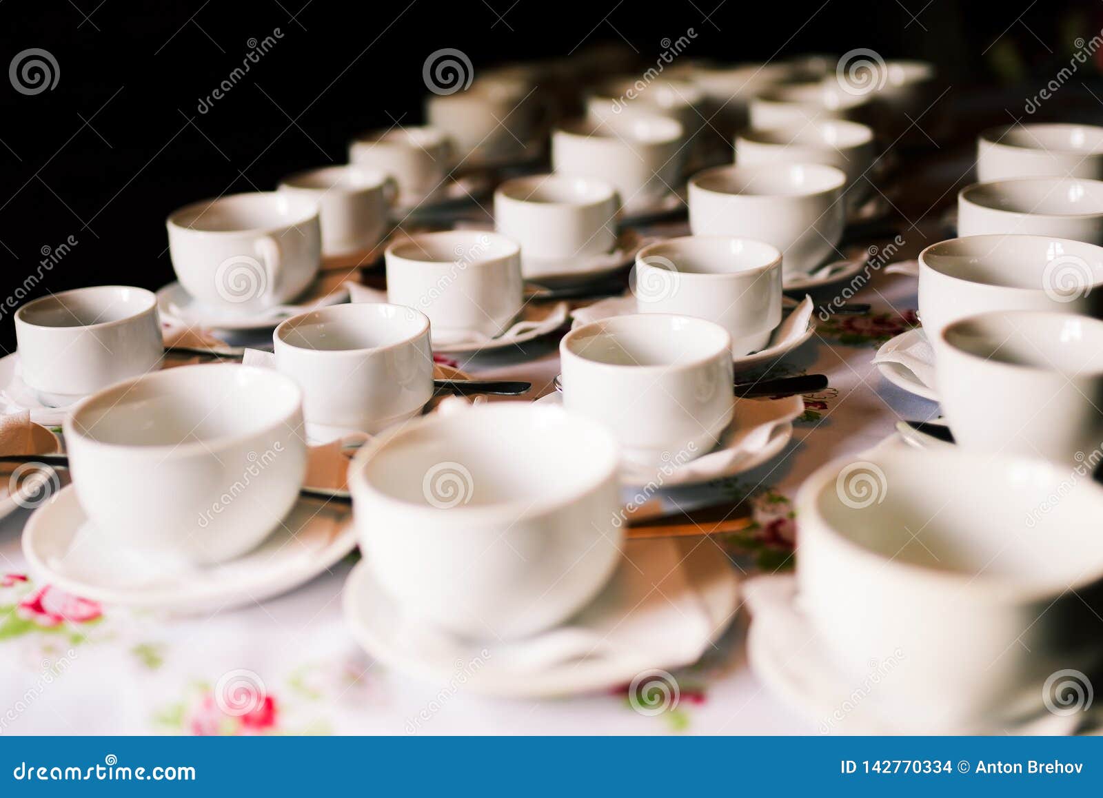 White Cups on the Table. Many Empty Cups Stand in a Row on the Table ...