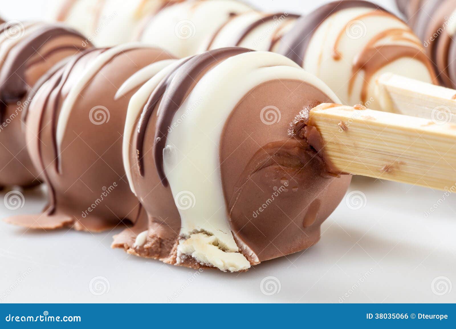 White Decorated Chocolate Stick Stock Photo - Image of candy, liquid ...