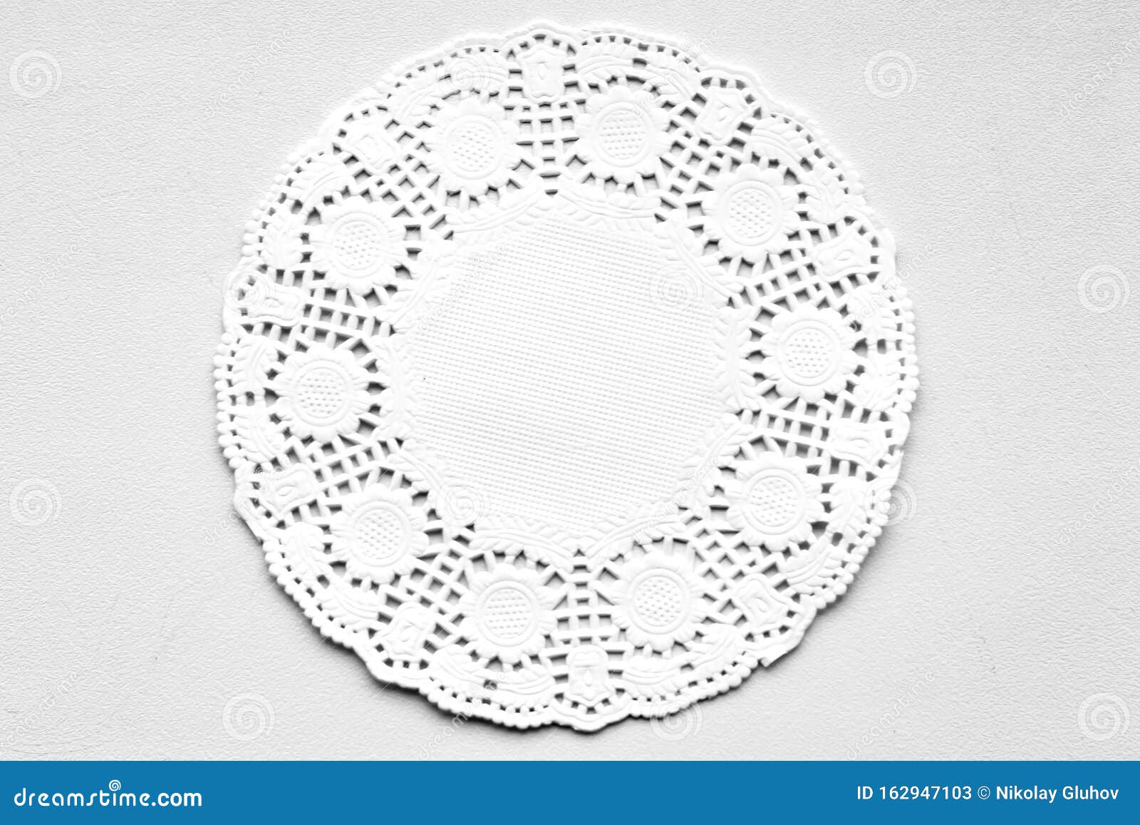 White Decorative Paper Round Napkin on a White-gray Background. Stock ...