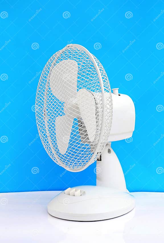 White Desk Oscillating Fan on Blue Background Stock Image - Image of ...