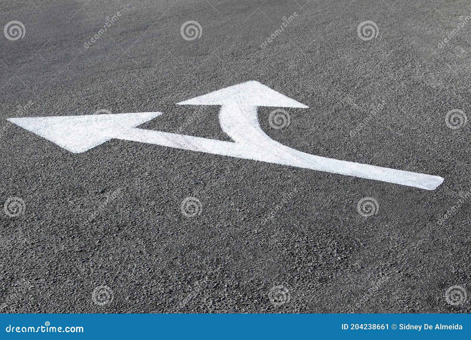 White Directional Arrows Marked on the Asphalt Stock Image - Image of ...