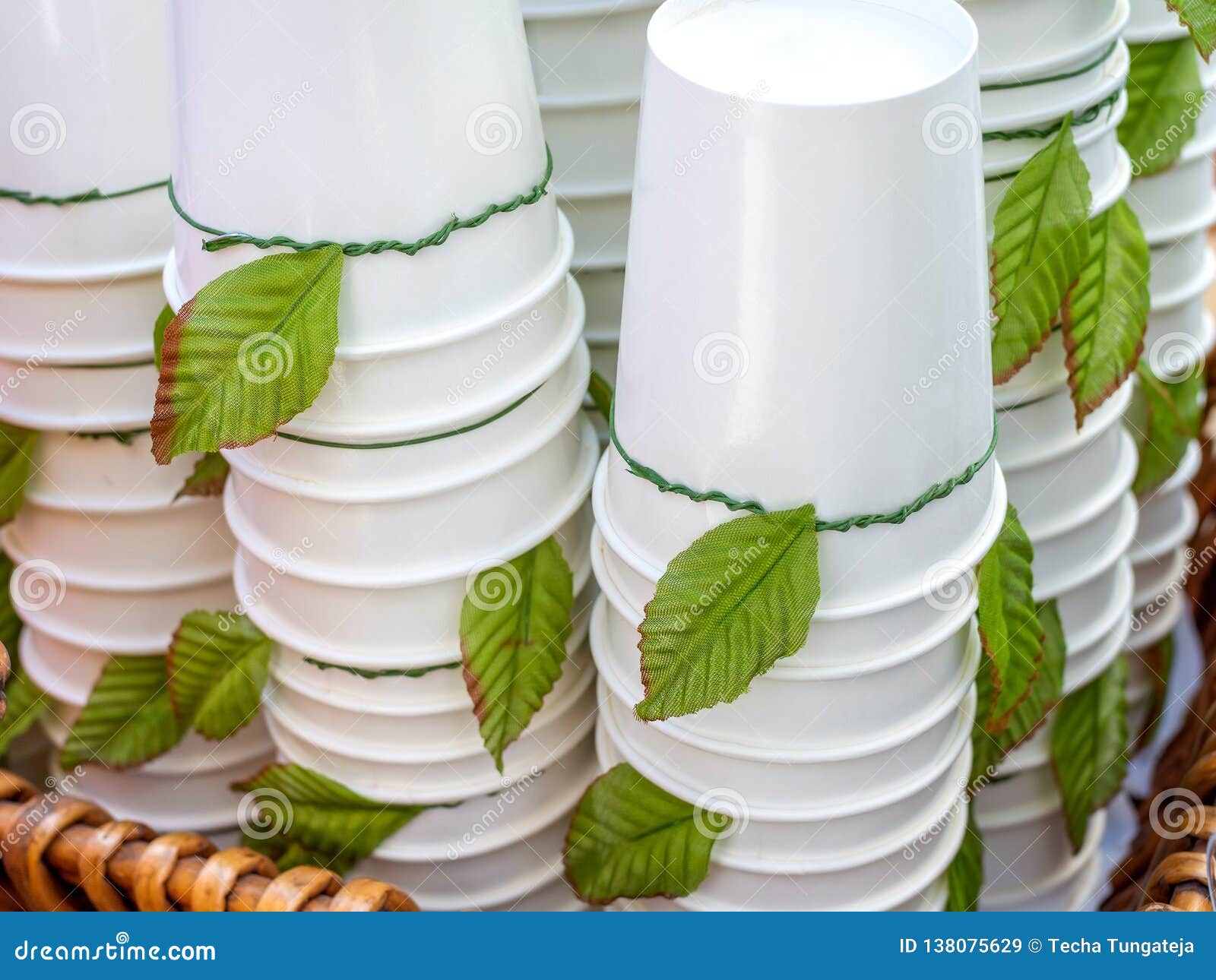 White Disposable Cups. Stack of White Paper Cups Decoration with Green ...