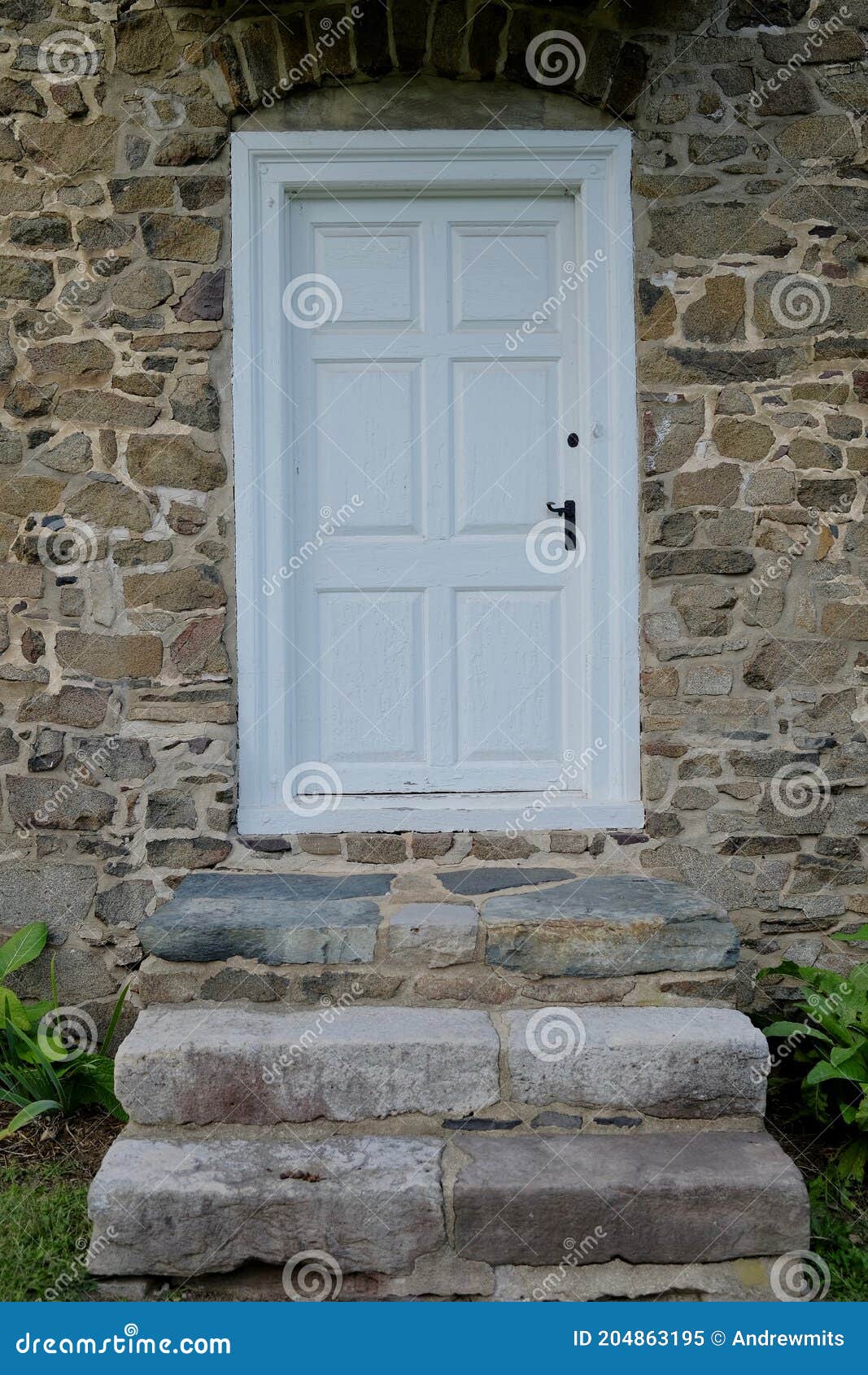 White Door in Rustic Stone Wall Stock Image - Image of rural, colonial ...