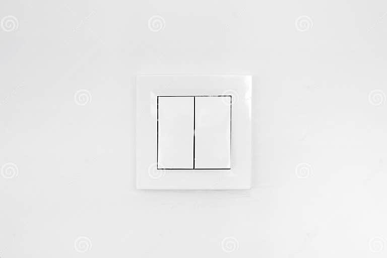 White Double Light Switch Mounted on a White Wall Stock Photo - Image ...