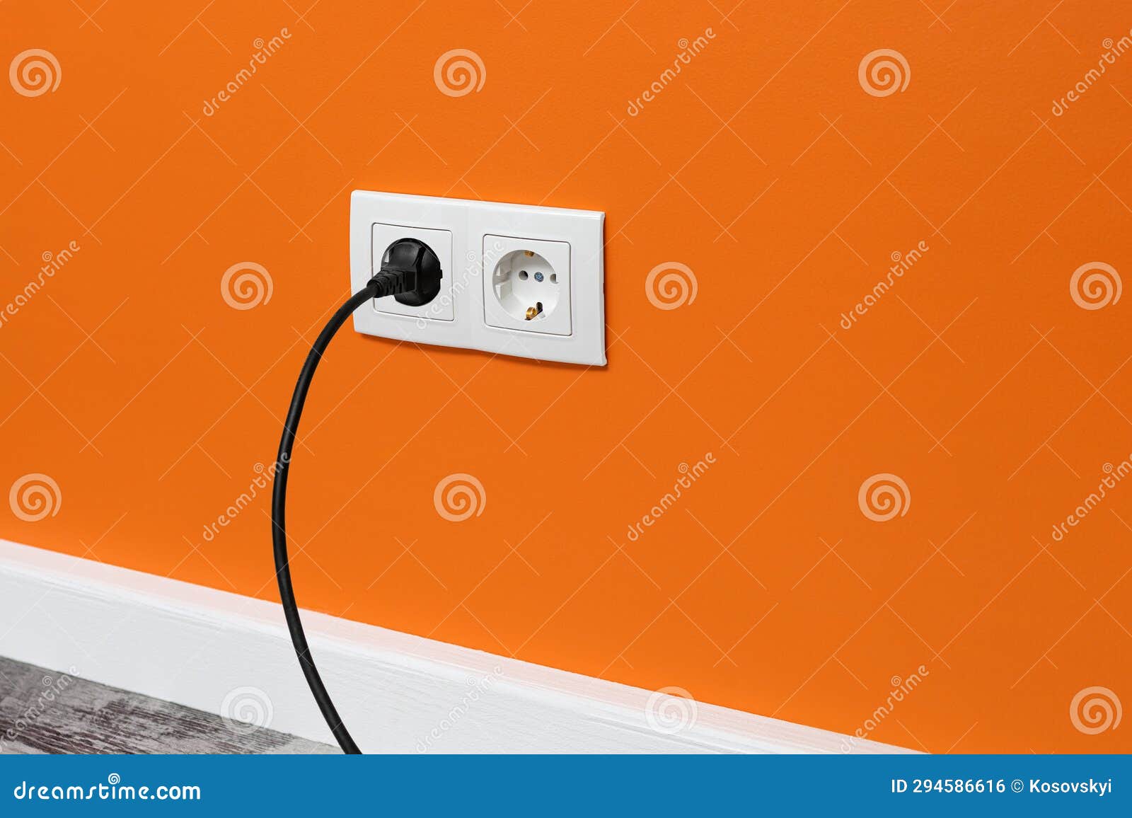 White Double Outlet on Orange Wall Stock Photo - Image of flooring ...
