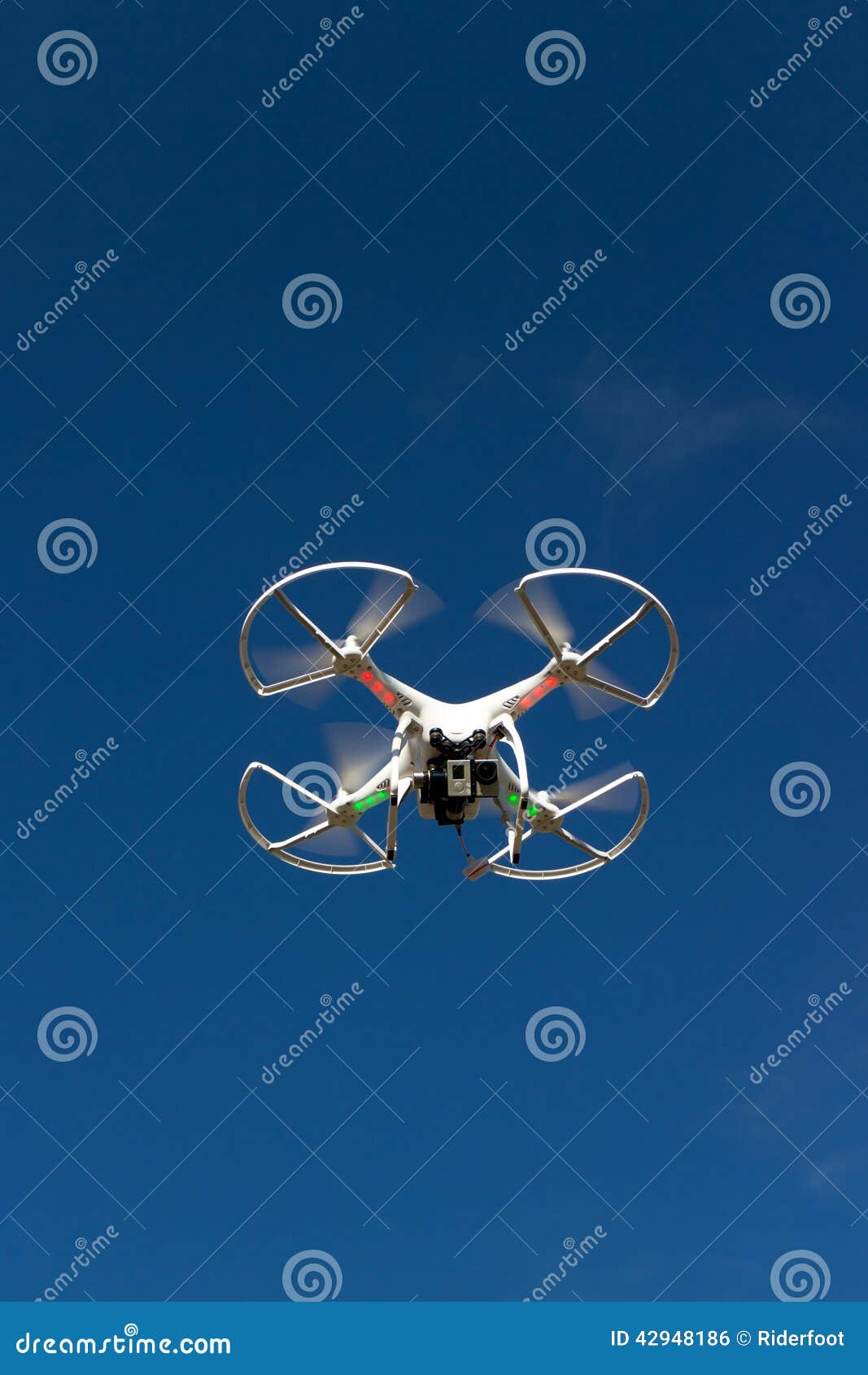 White drone with cam stock photo. Image of powered, blue - 42948186