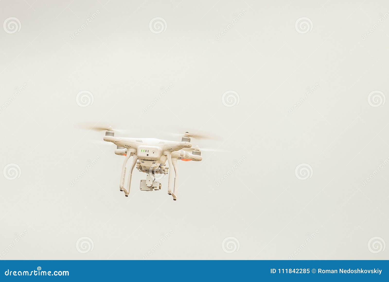 White Drone with Camera Flying in the Sky Stock Image - Image of ...