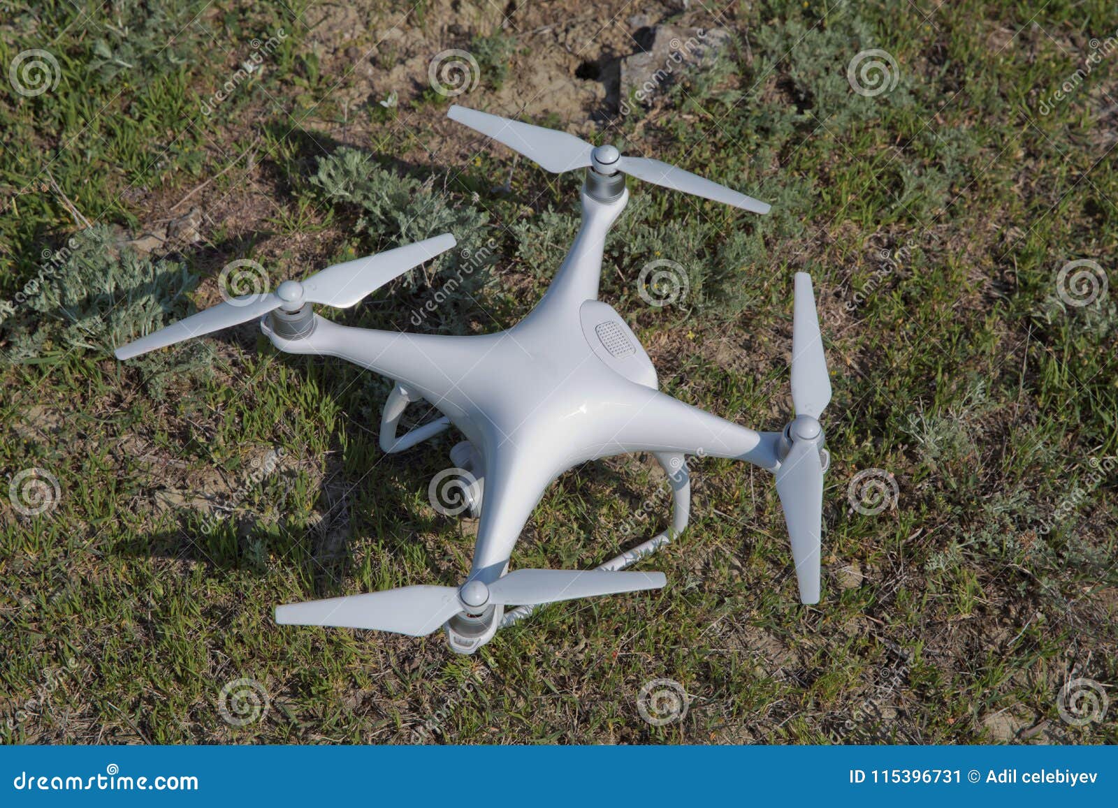 White Drone with Digital Camera Flying in Sky Over Mountain Drone with ...