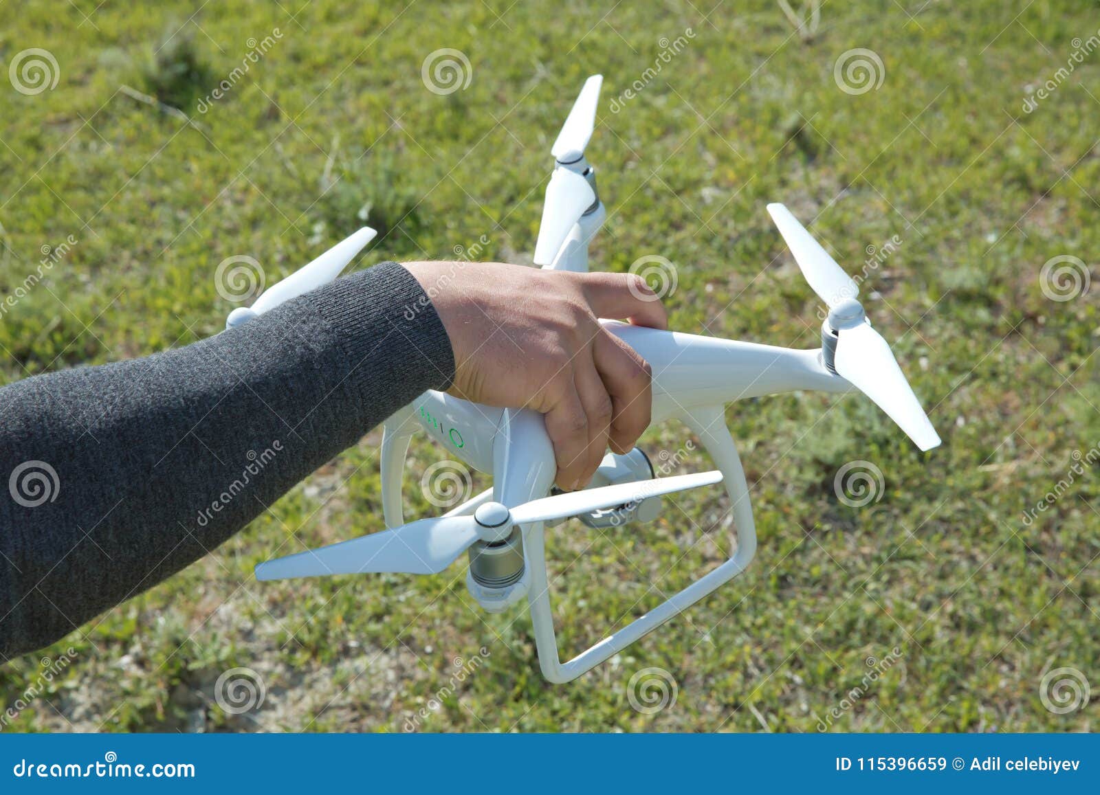 White Drone with Digital Camera Flying in Sky Over Mountain Drone with ...