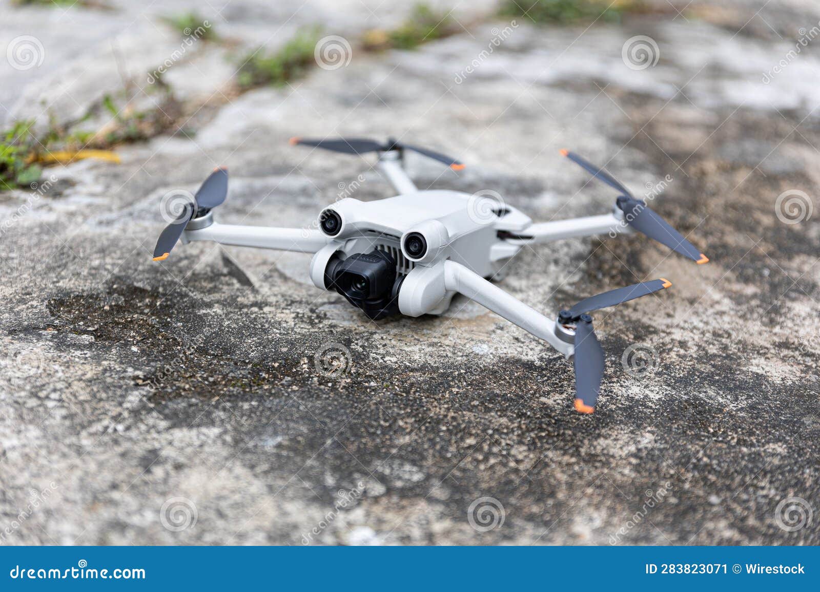 White drone on the ground stock image. Image of drone - 283823071